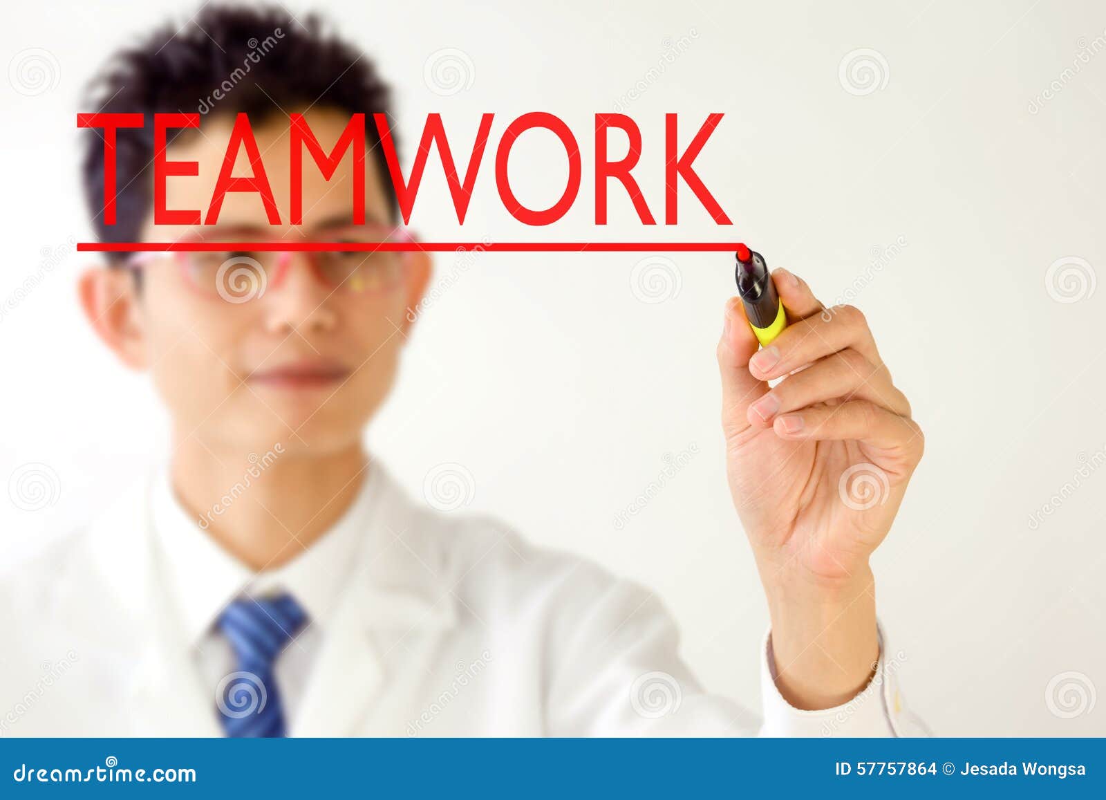 Business Man Handwriting TEAMWORK on on Visual Screen Stock Photo ...