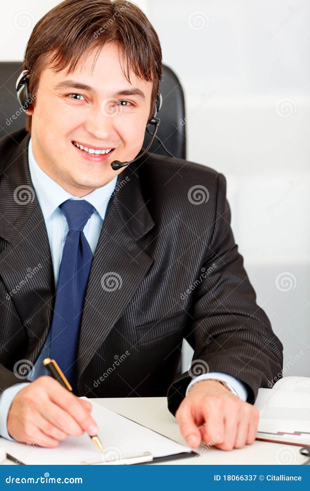 Business Man with Headset Sitting at Office Desk Stock Image - Image of ...