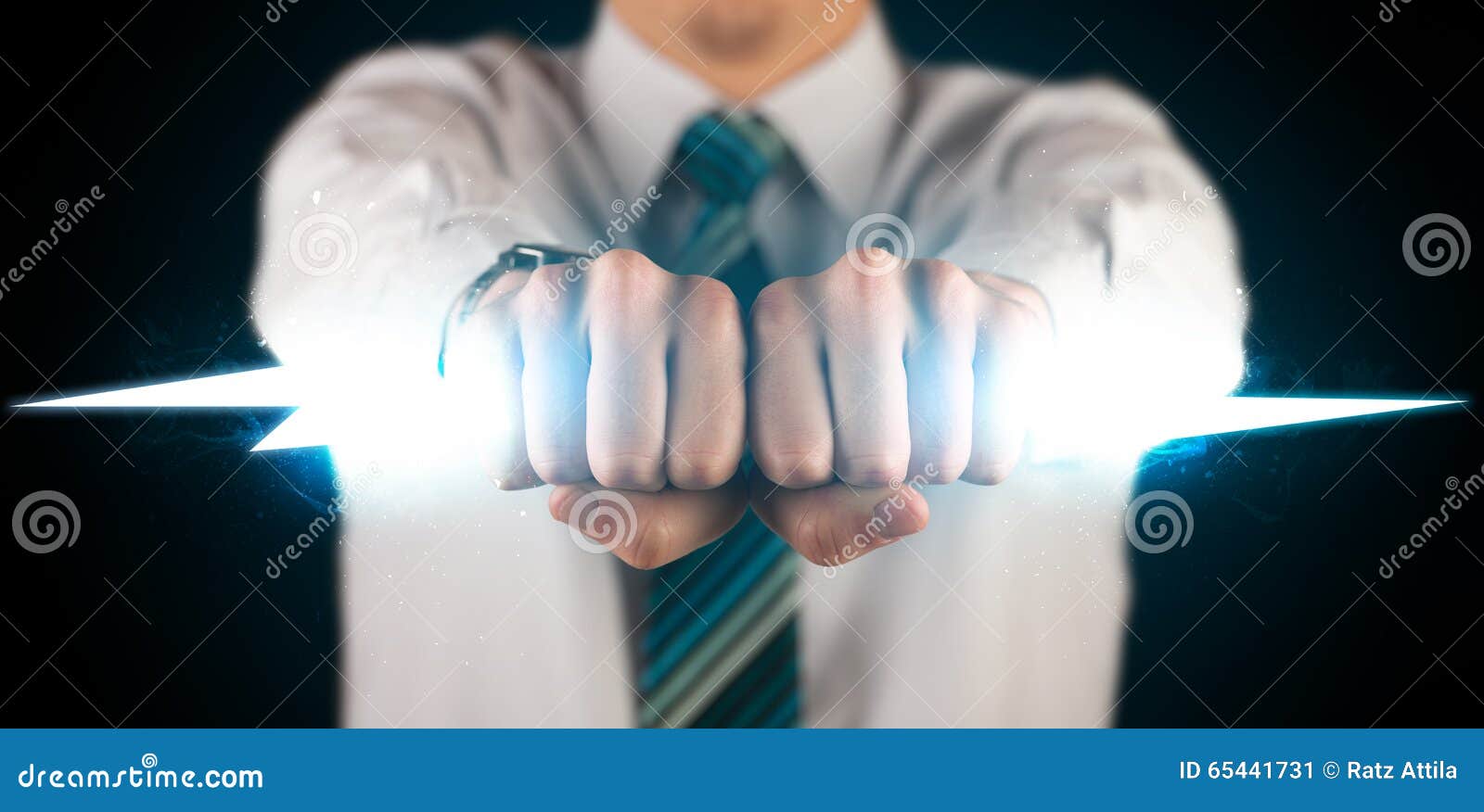 Business Man Holding Glowing Lightning Bolt in His Hands Stock Image ...