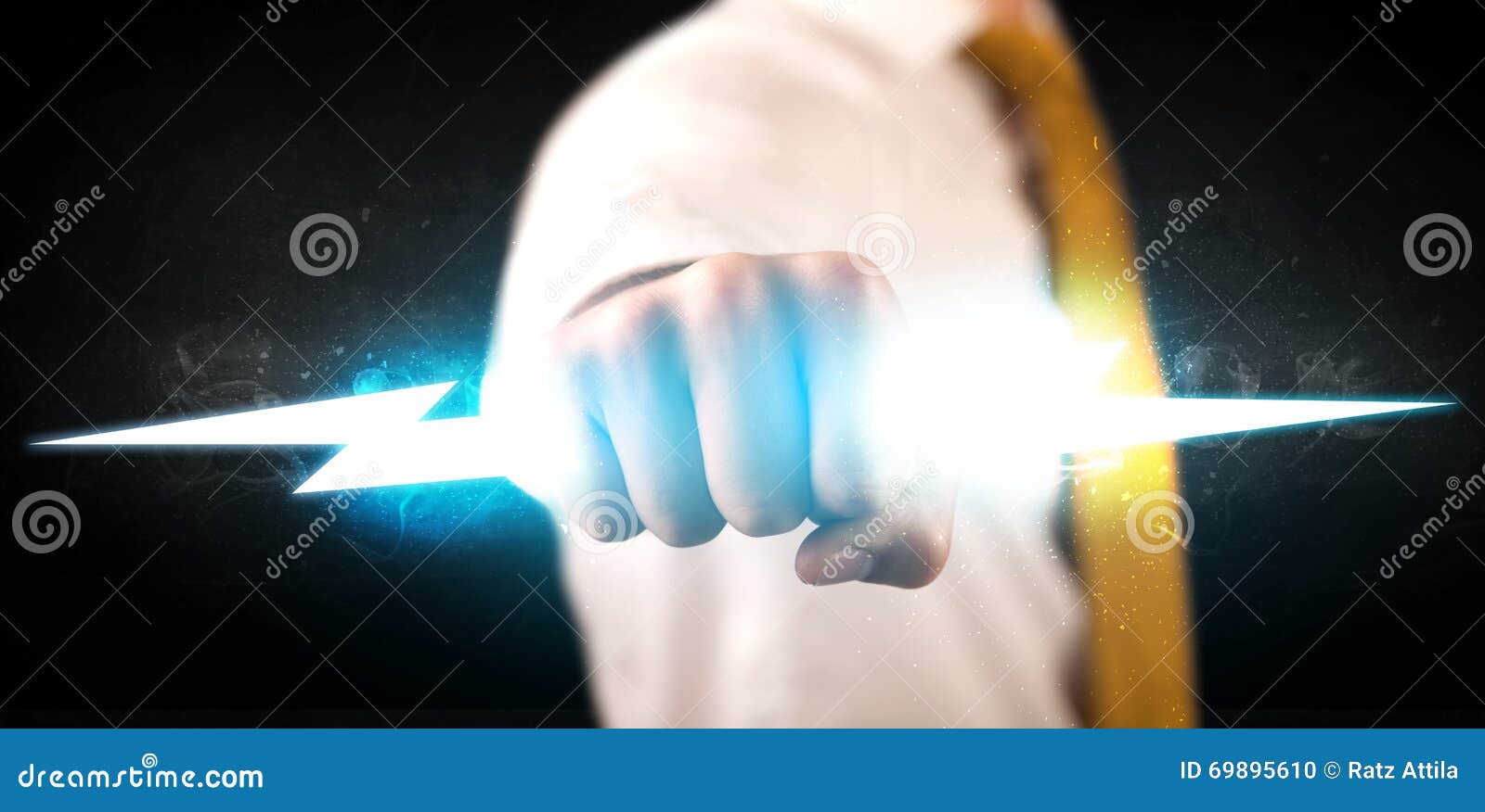 Business Man Holding Glowing Lightning Bolt in His Hands Stock Photo ...