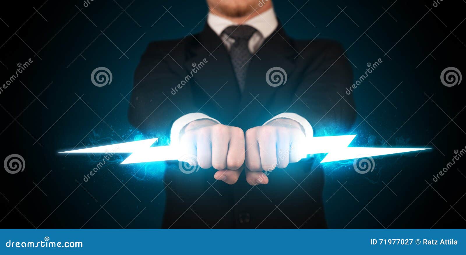 Business Man Holding Glowing Lightning Bolt in His Hands Stock Image ...