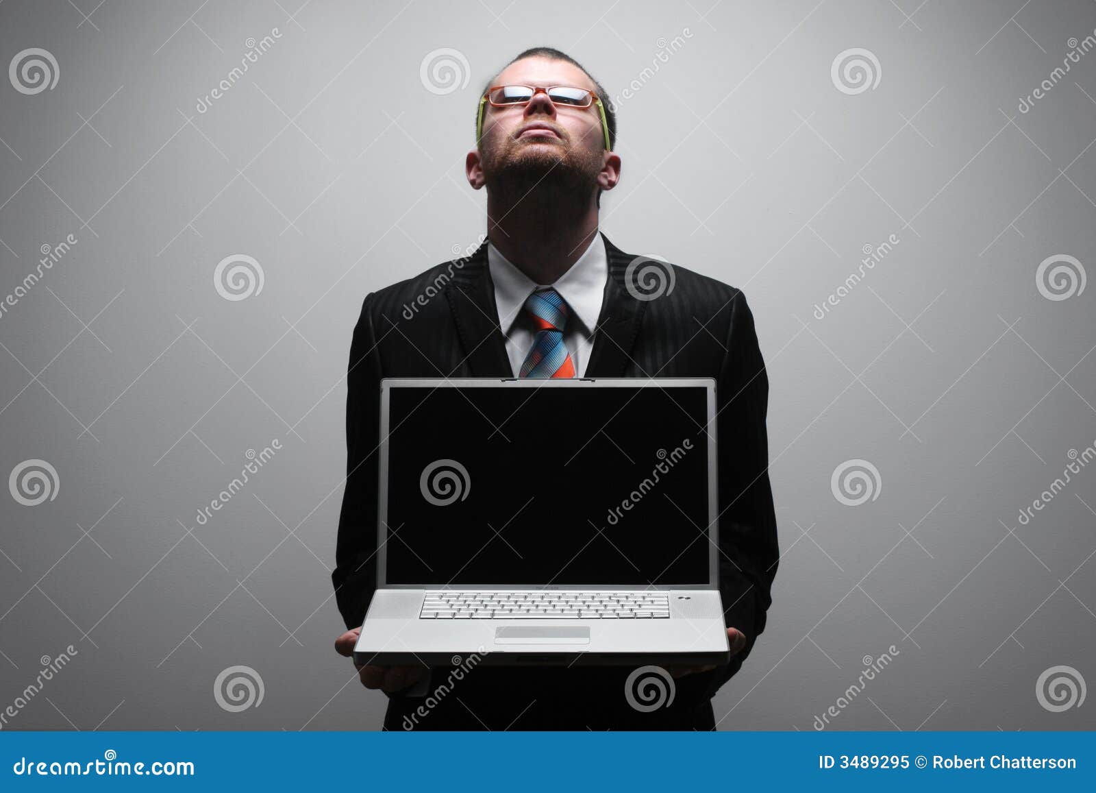 Business Man Holding Laptop Stock Image - Image of suit, screen: 3489295