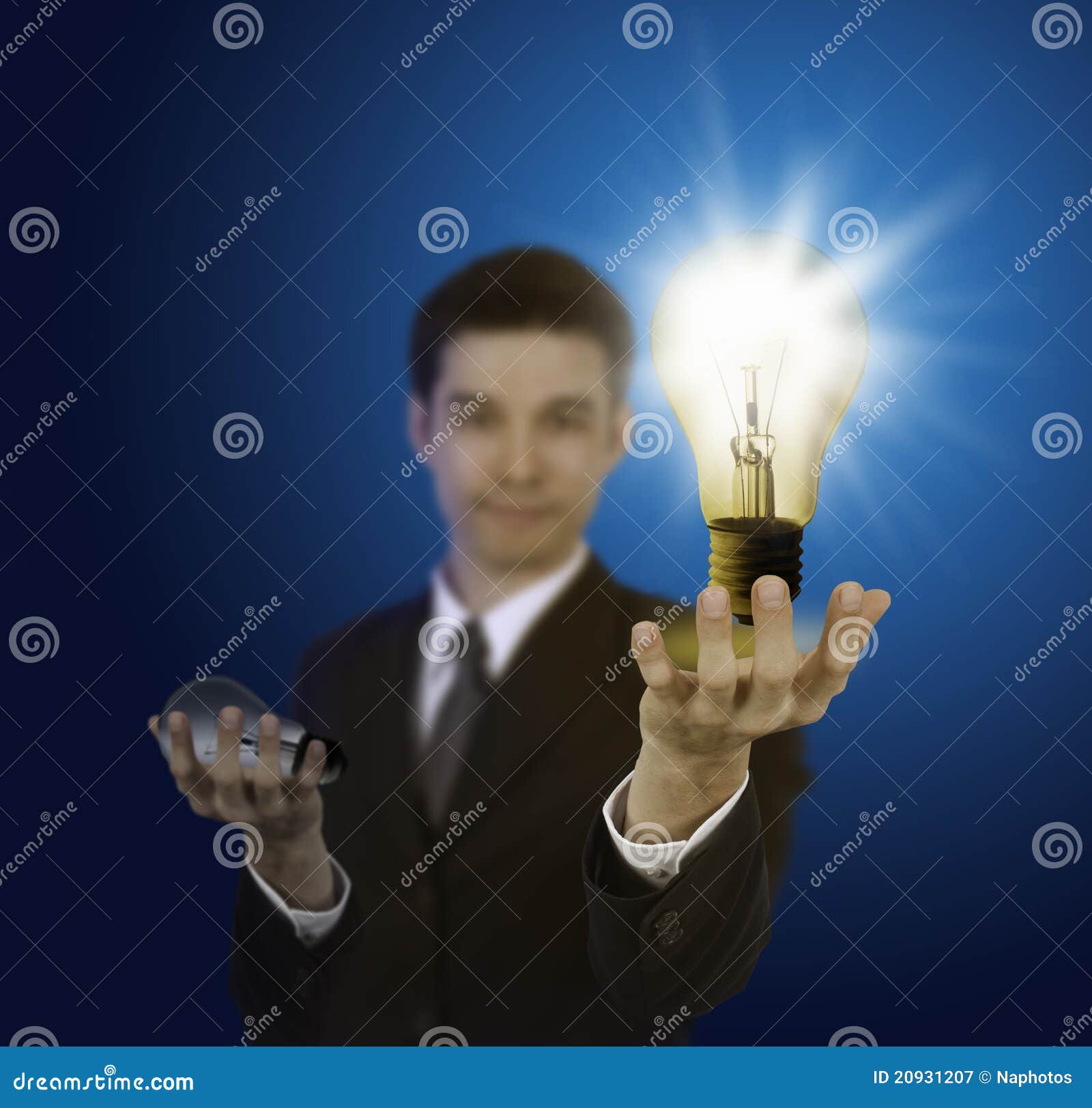 Business Man Holding Light Bulb Stock Image - Image of modern, employee ...