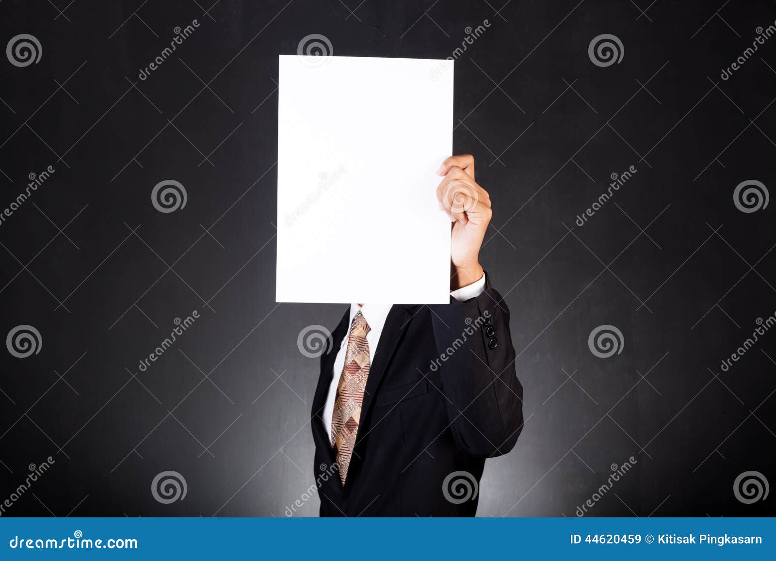 A Business Man Holding a Paper in Front of His Face Stock Image - Image ...