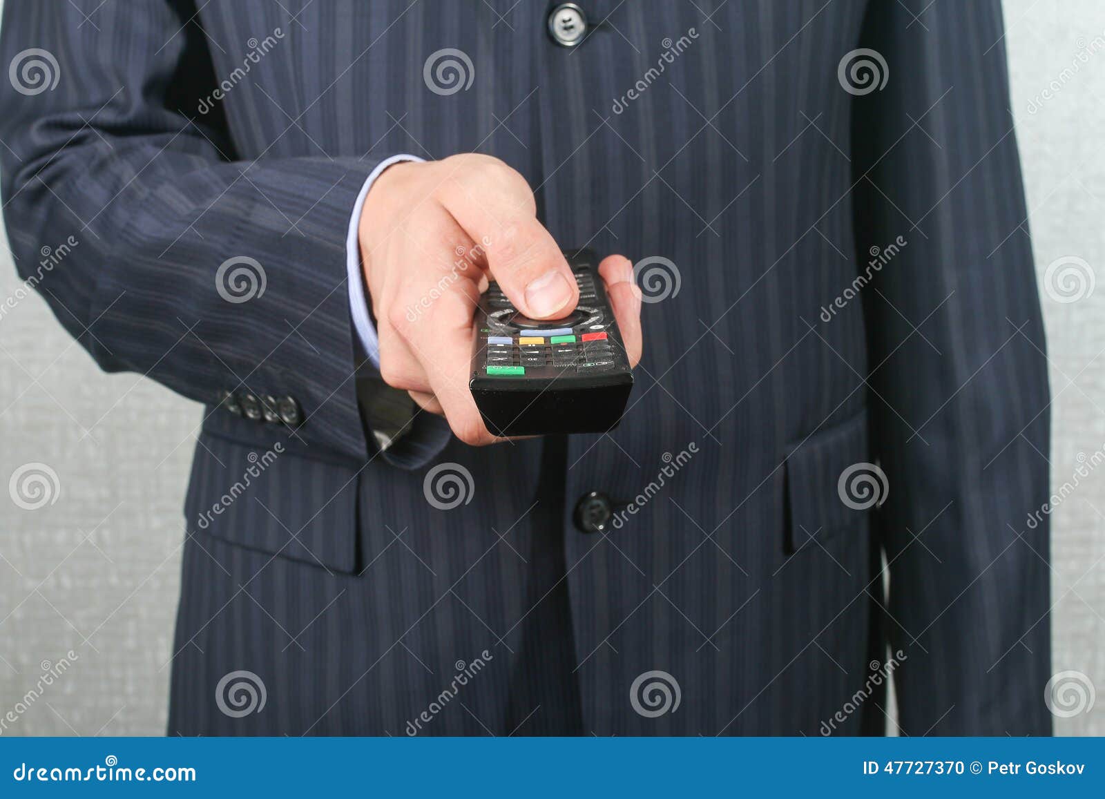 Business Man Holding a Remote Stock Photo - Image of expression, person ...