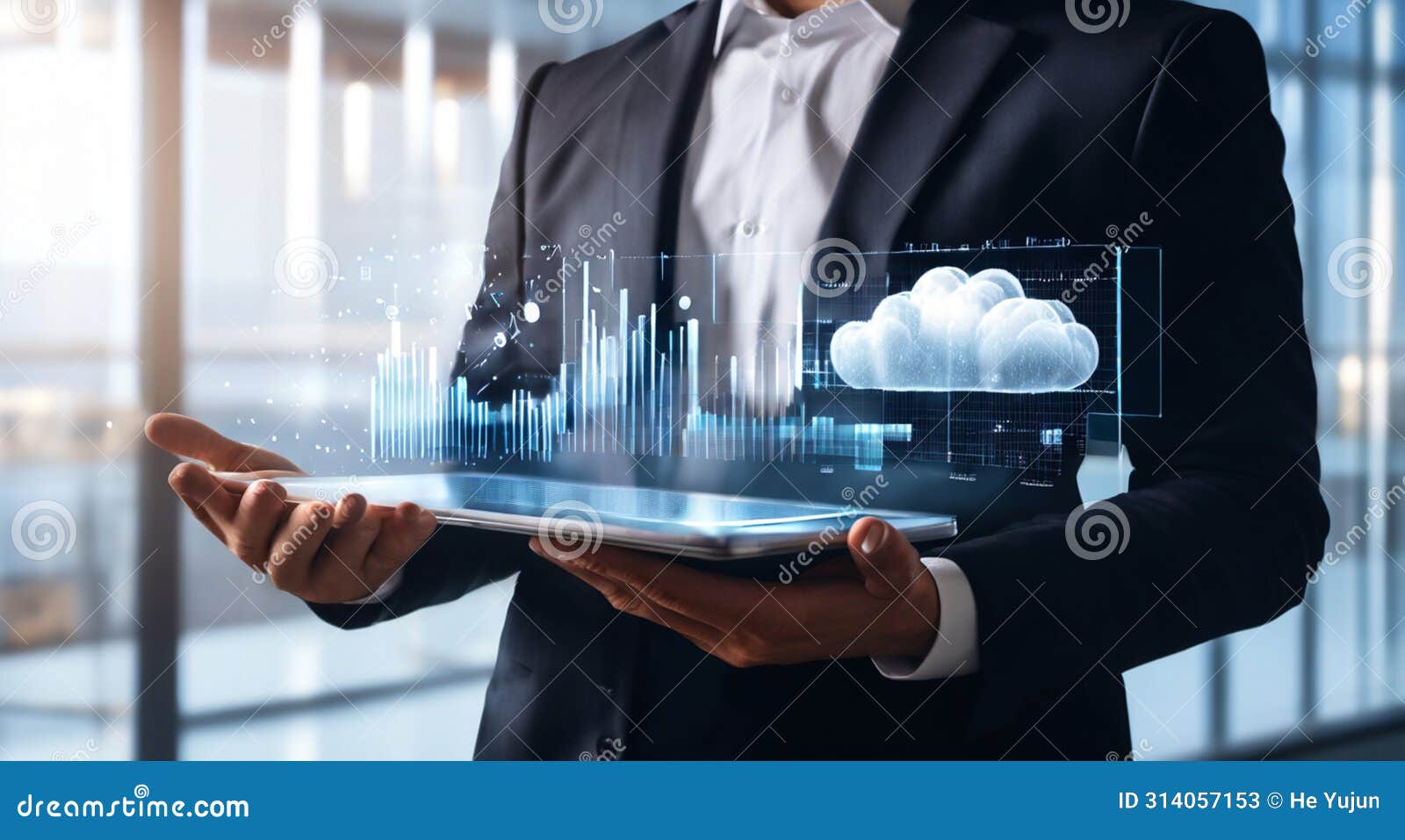 Business Man Holding a White Touchpad with Cloud Technology and Charts ...