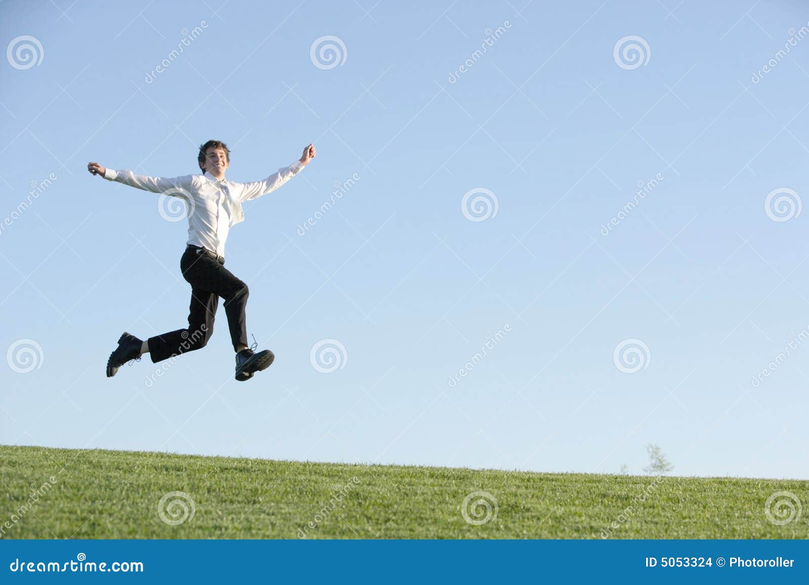 A Business Man Jumping for Joy Stock Photo - Image of spring ...