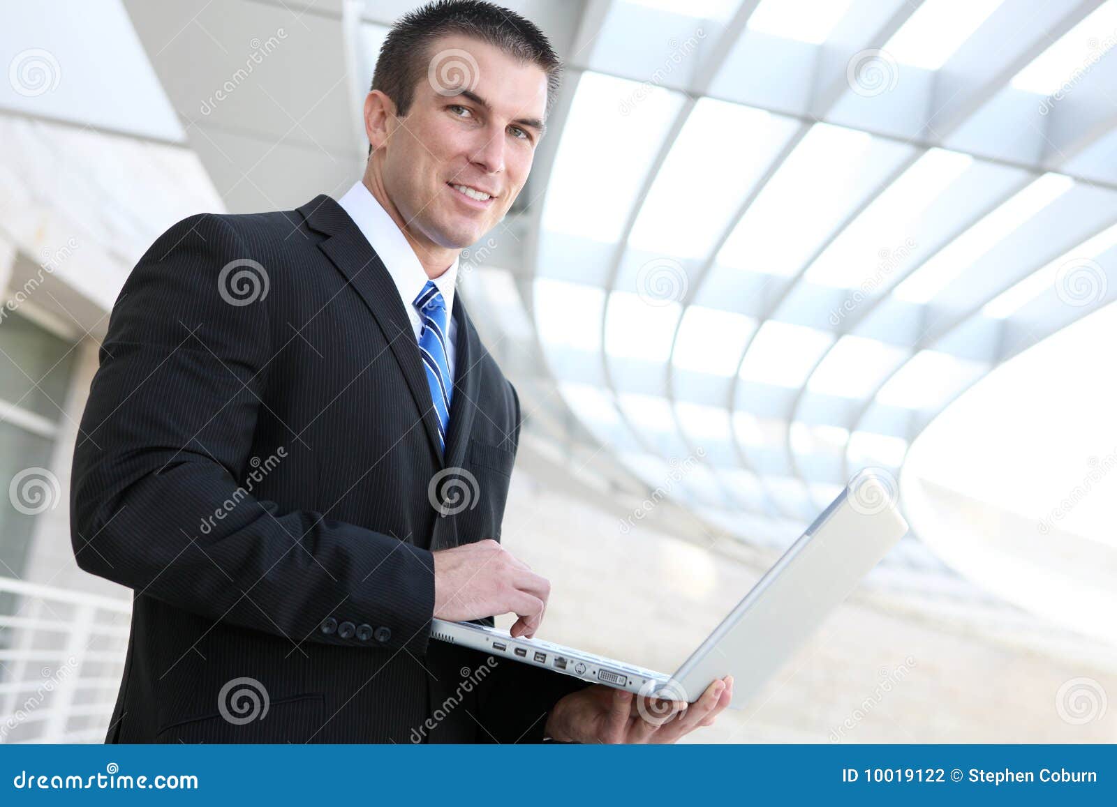 Business Man with Laptop stock photo. Image of laptop - 10019122