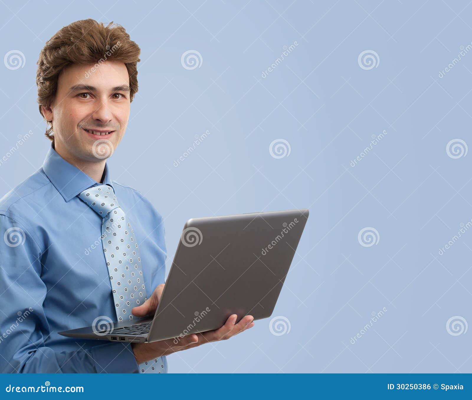 Businessman with laptop stock photo. Image of laptop - 30250386