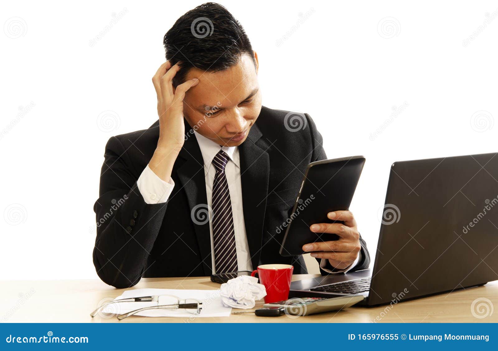 Business Man Looking Into Tablet Computer And Having Headache On White ...