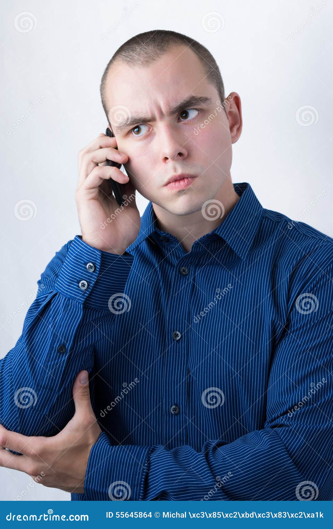 Business Man Making a Call with Serious Face Expression Stock Photo ...