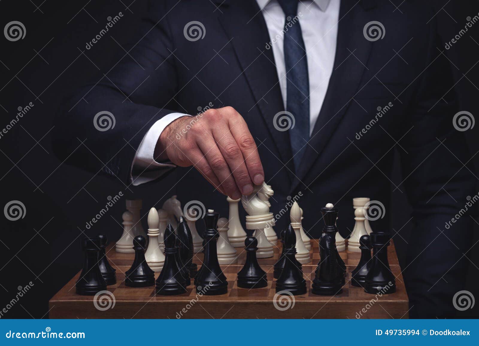 Business man playing chess stock photo. Image of adult - 49735994