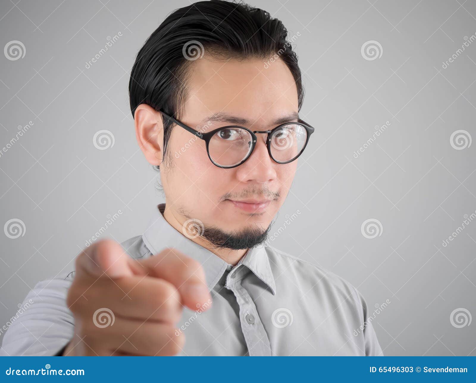 Business man pointing. stock image. Image of adult, grey - 65496303
