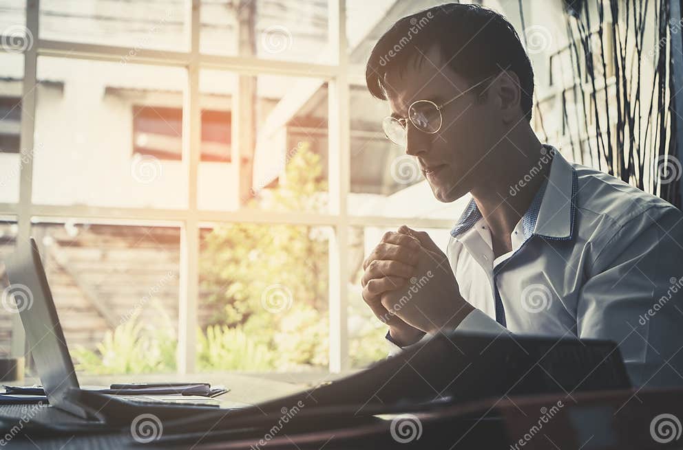 Business Man Praying for Business on Computer Stock Photo - Image of ...