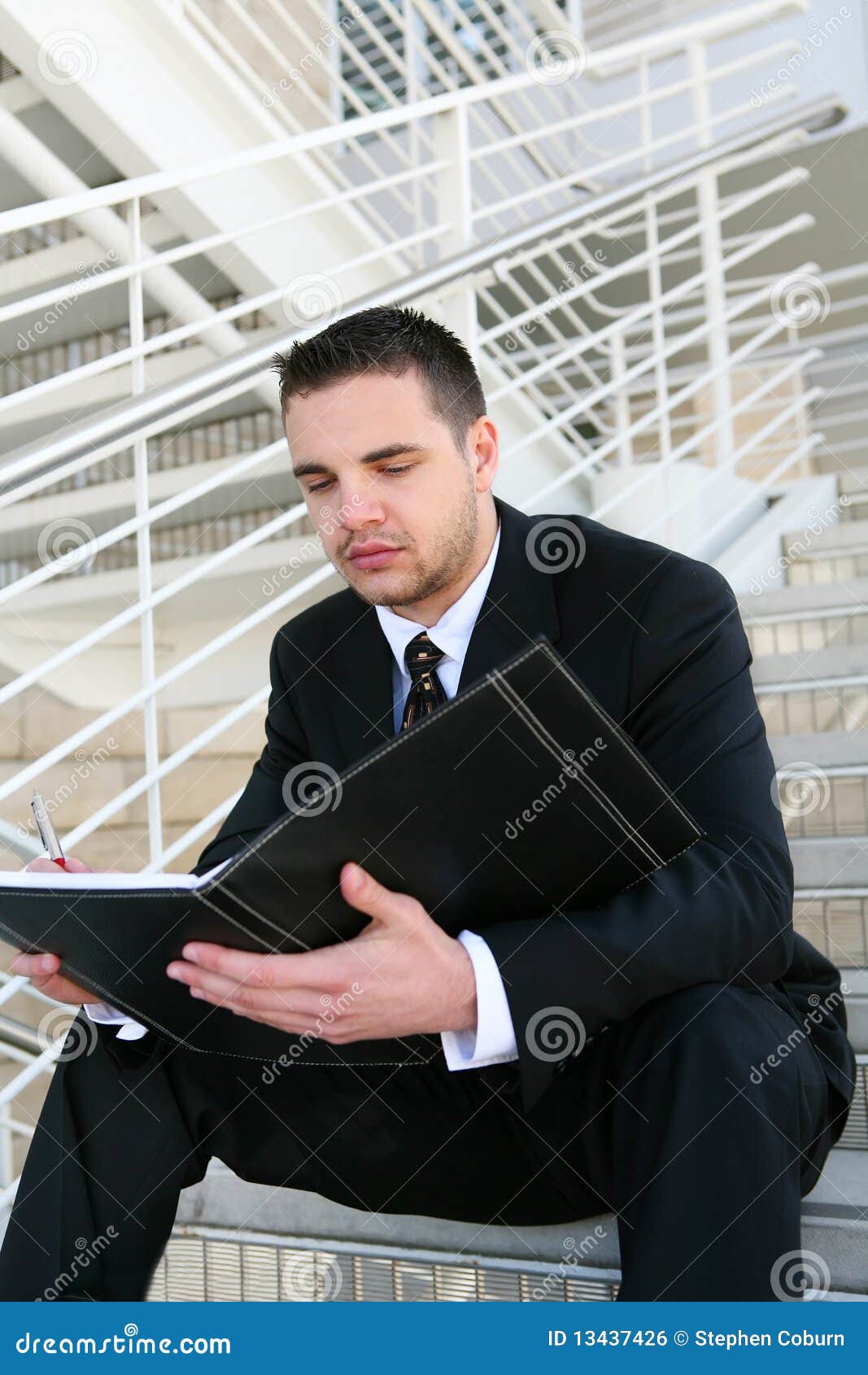 Business Man Reading stock photo. Image of corporate - 13437426