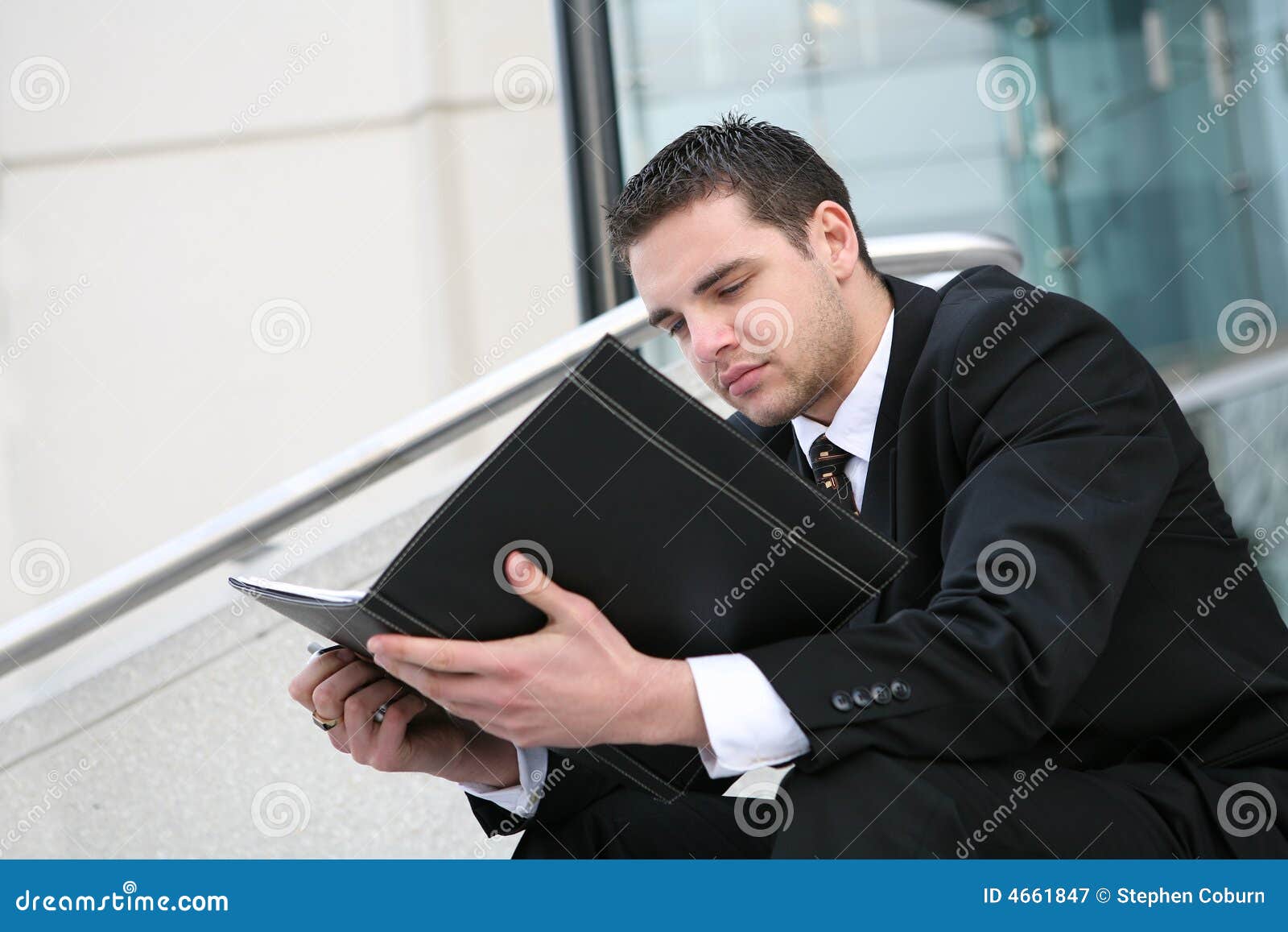 Business Man Reading stock image. Image of male, outside - 4661847