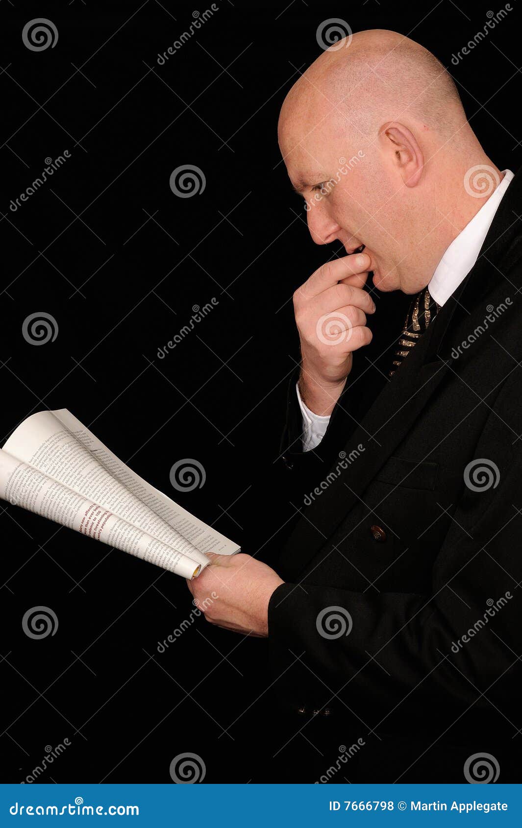 Business Man Reading Paperwork Stock Photo - Image of looks, think: 7666798