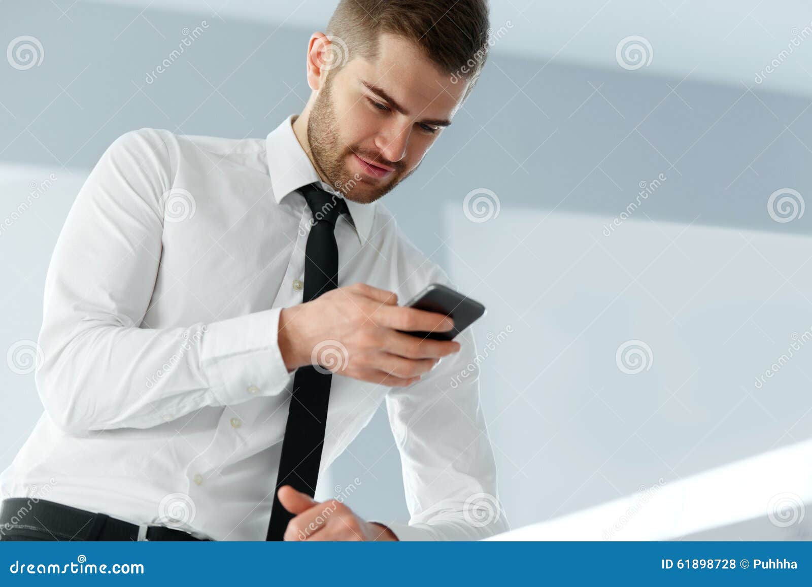 Business Man Reading Something on the Screen of His Cell Phone Stock ...