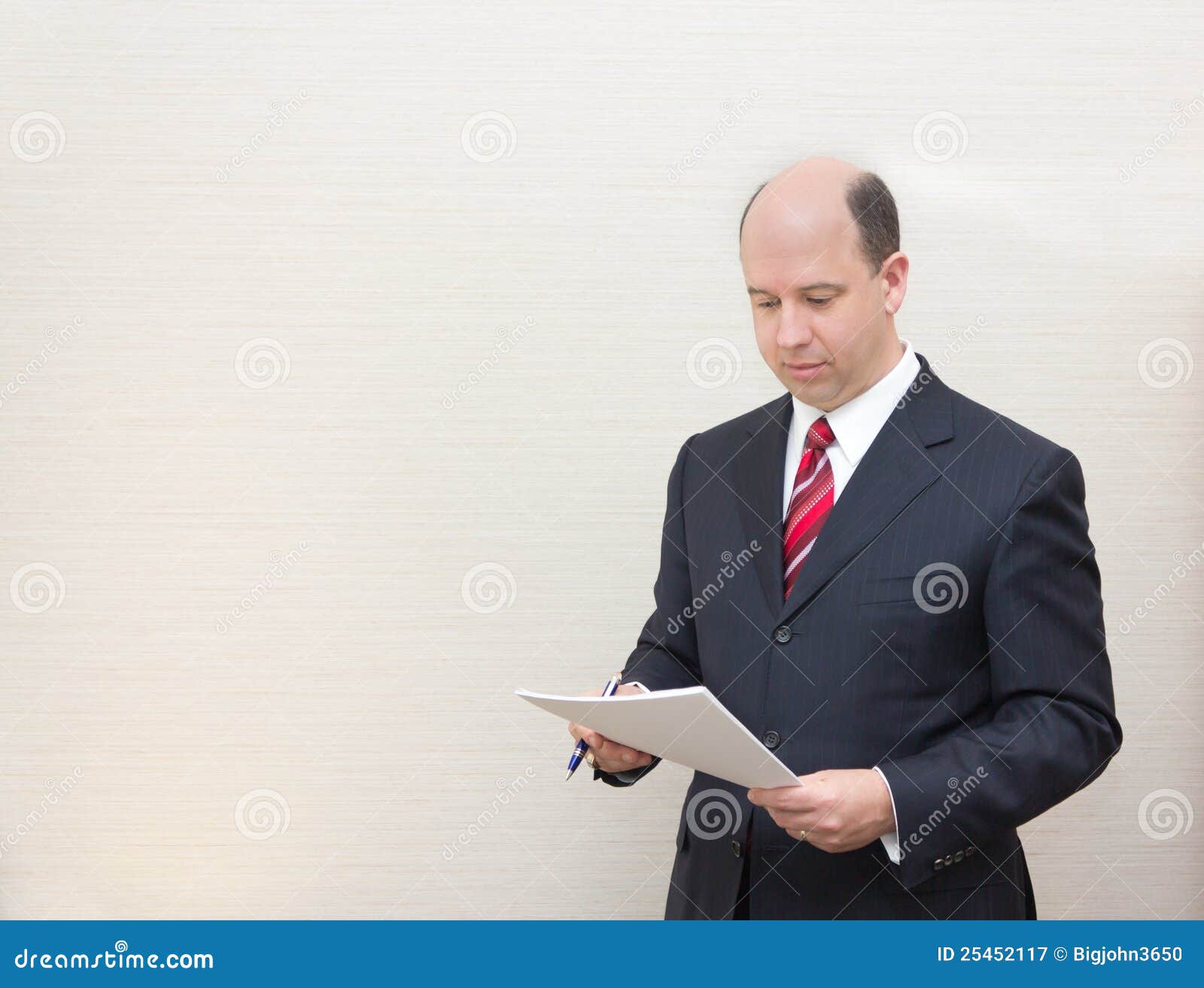 Business Man Reviewing a Document Stock Image - Image of ambitious ...