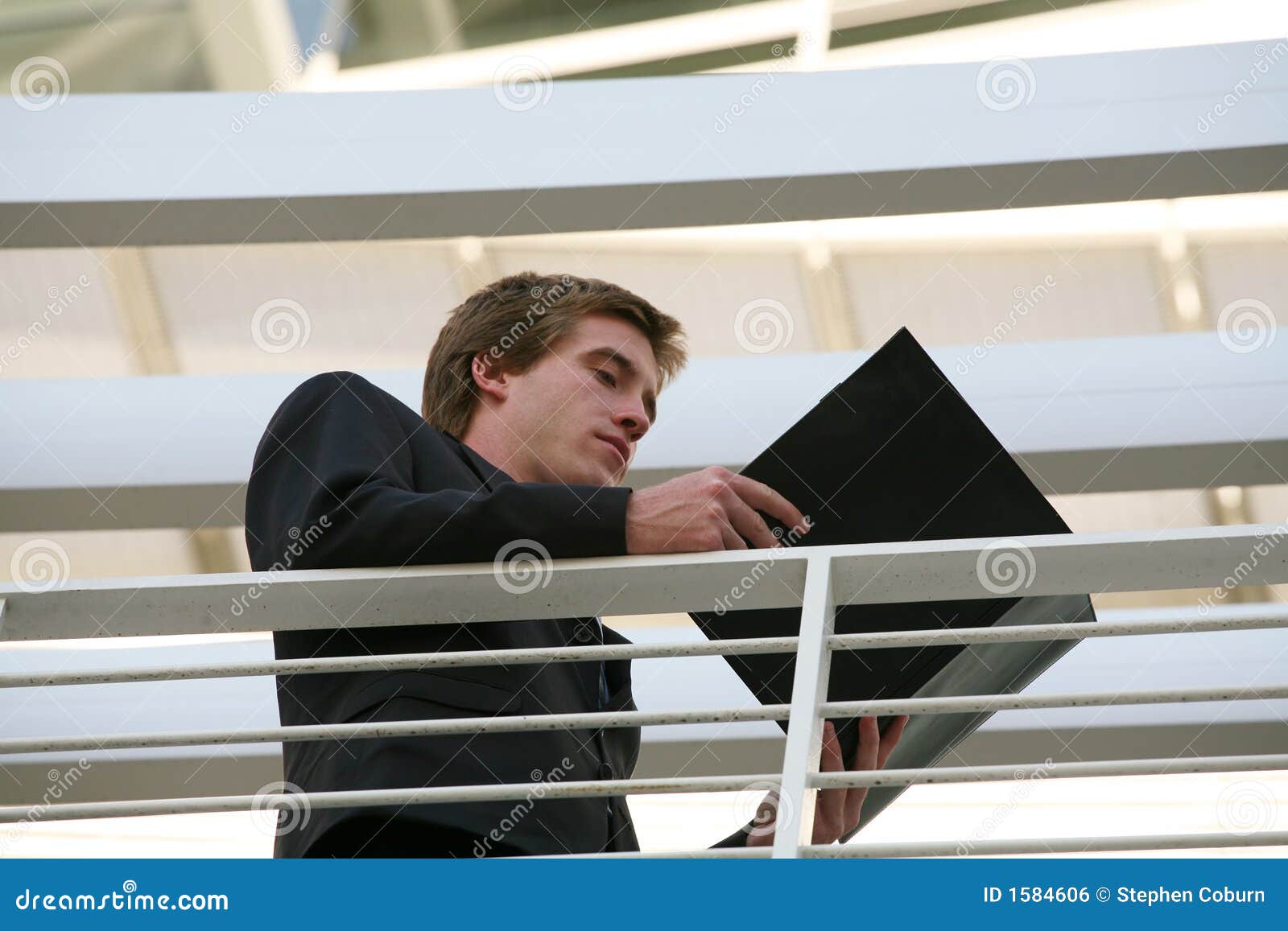 Business Man Reviewing Notes Stock Photo - Image of briefcase, handsome ...