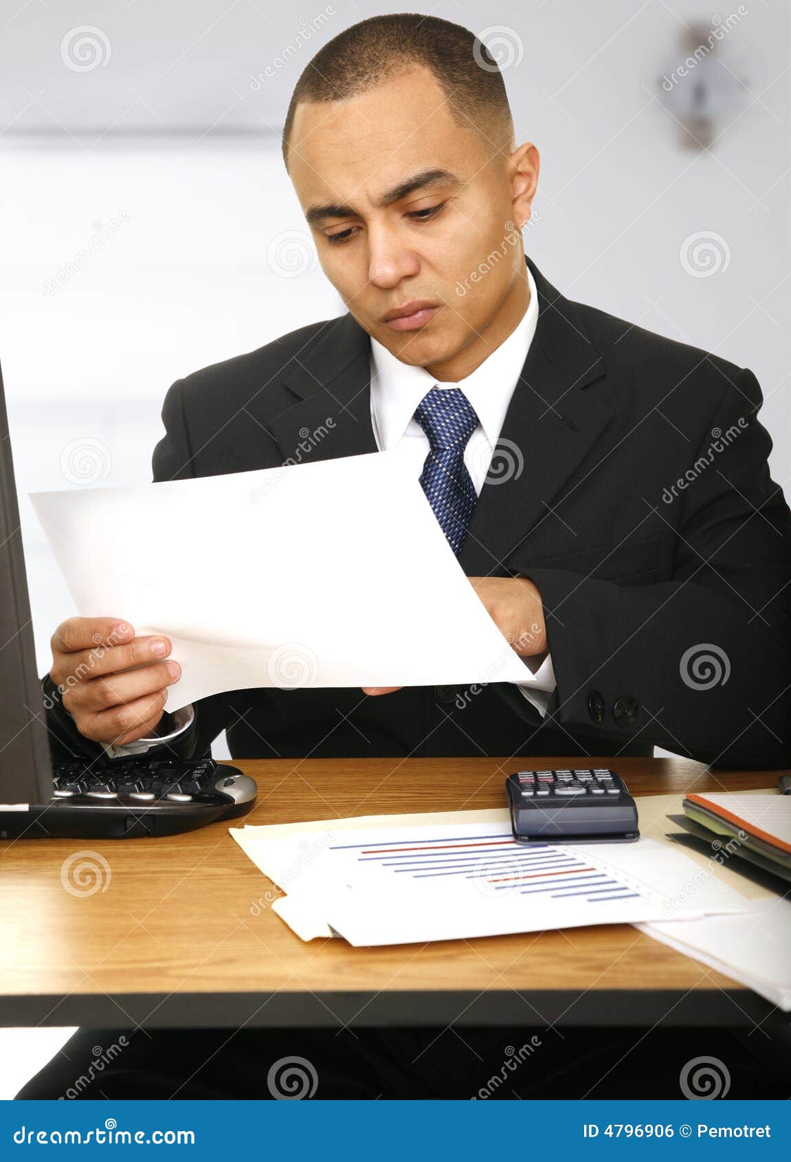 Business Man with Serious Expression Looking at Pa Stock Photo - Image ...
