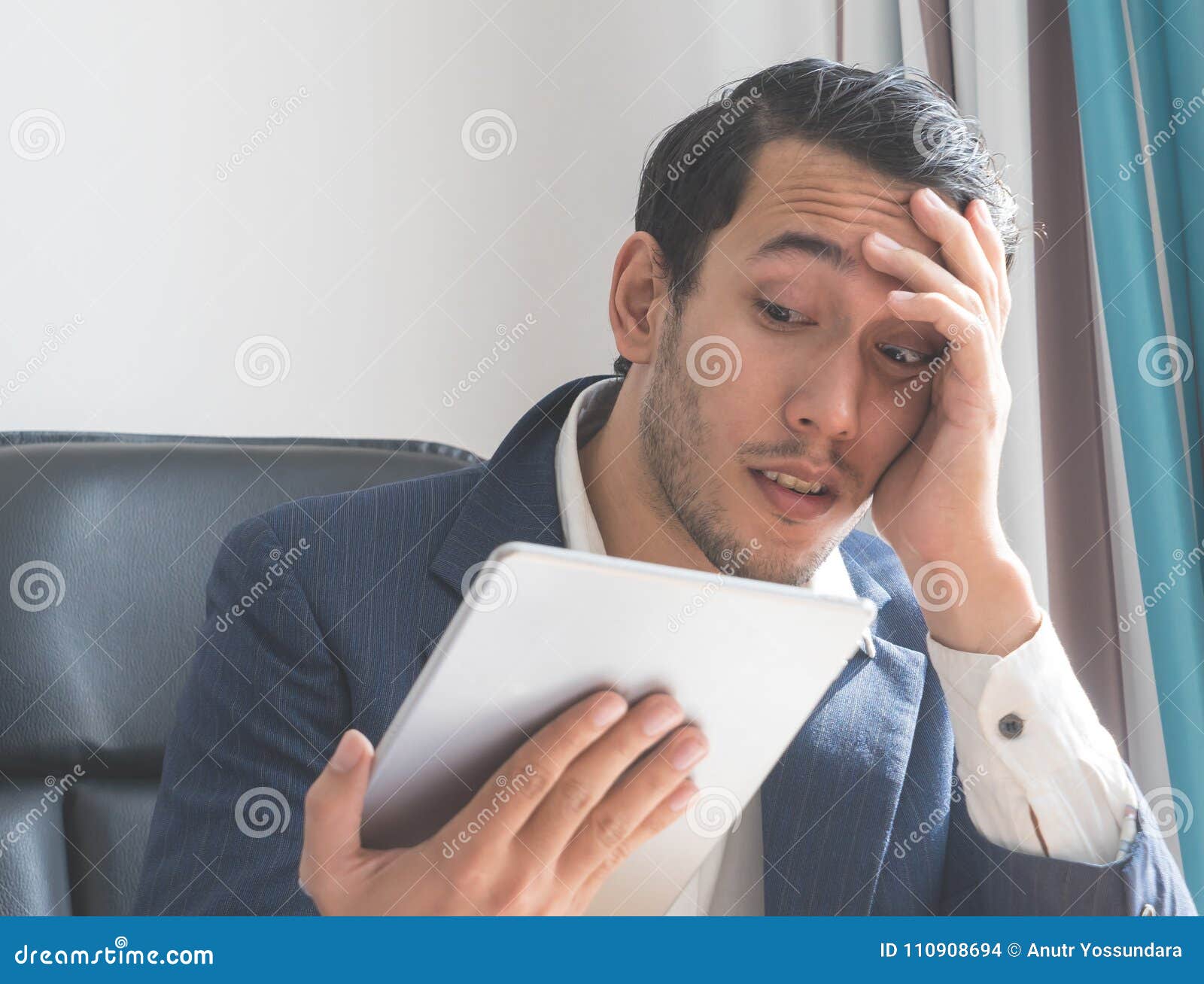 Business Man Shock Looking at Tablet Computer Stock Photo - Image of ...