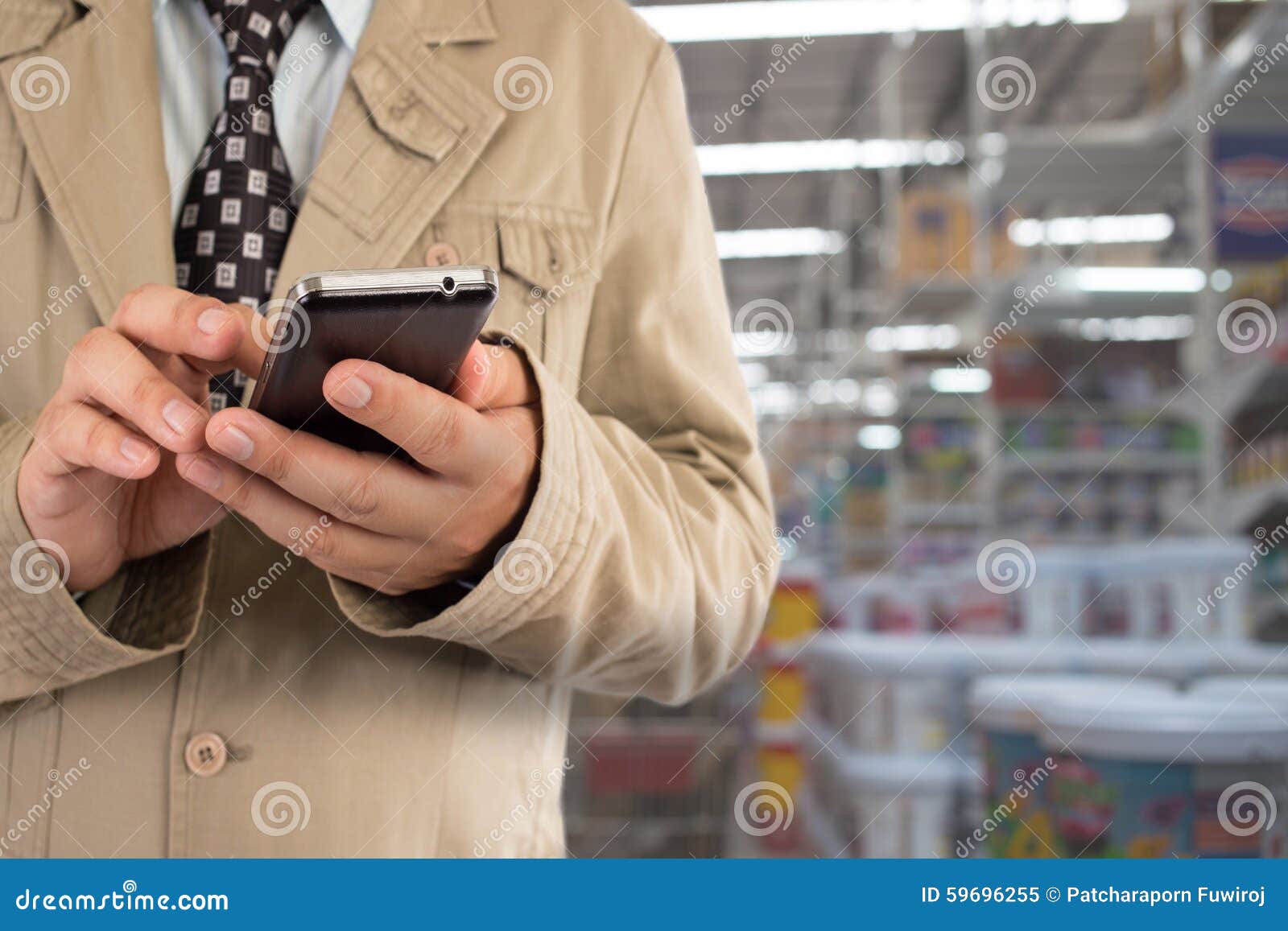 Business Man in Shopping Mall Using Mobile Phone. Stock Image - Image ...