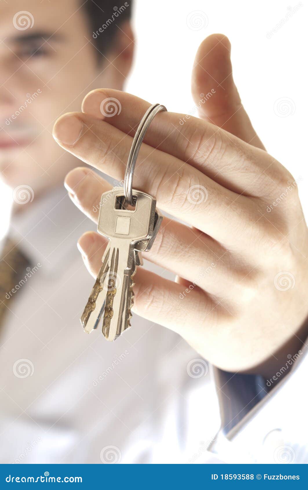 Business man showing key stock photo. Image of showing - 18593588