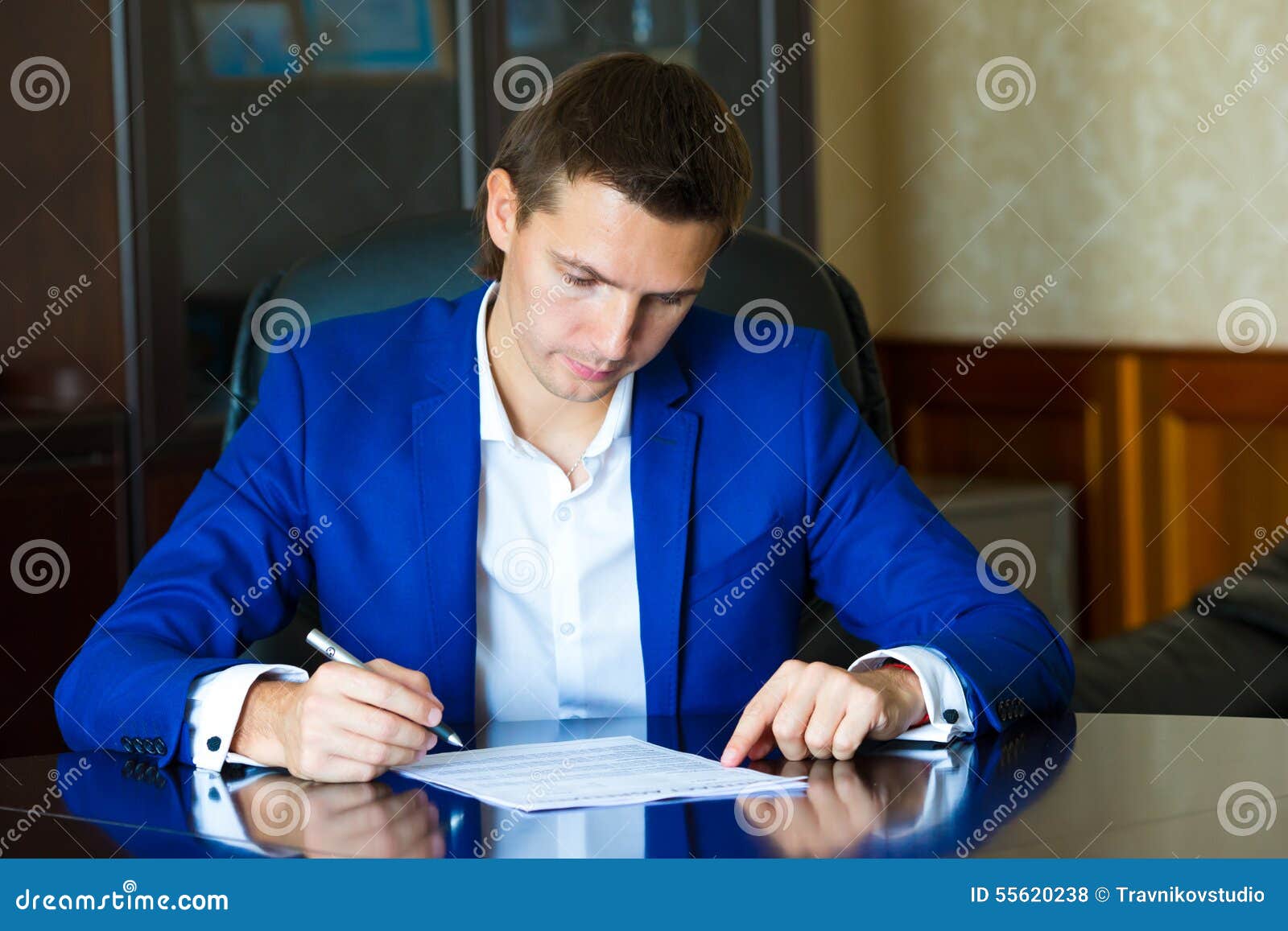 Business Man Signing a Contract in Big Office Stock Photo - Image of ...