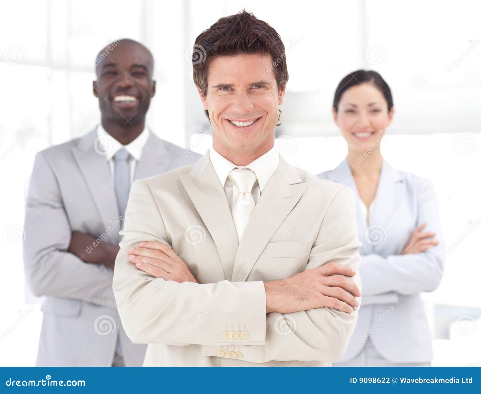 Business Man Smiling in Front of Business Team Stock Photo - Image of ... Business Man Smiling in Front of Business Team Stock Photo - Image of ...