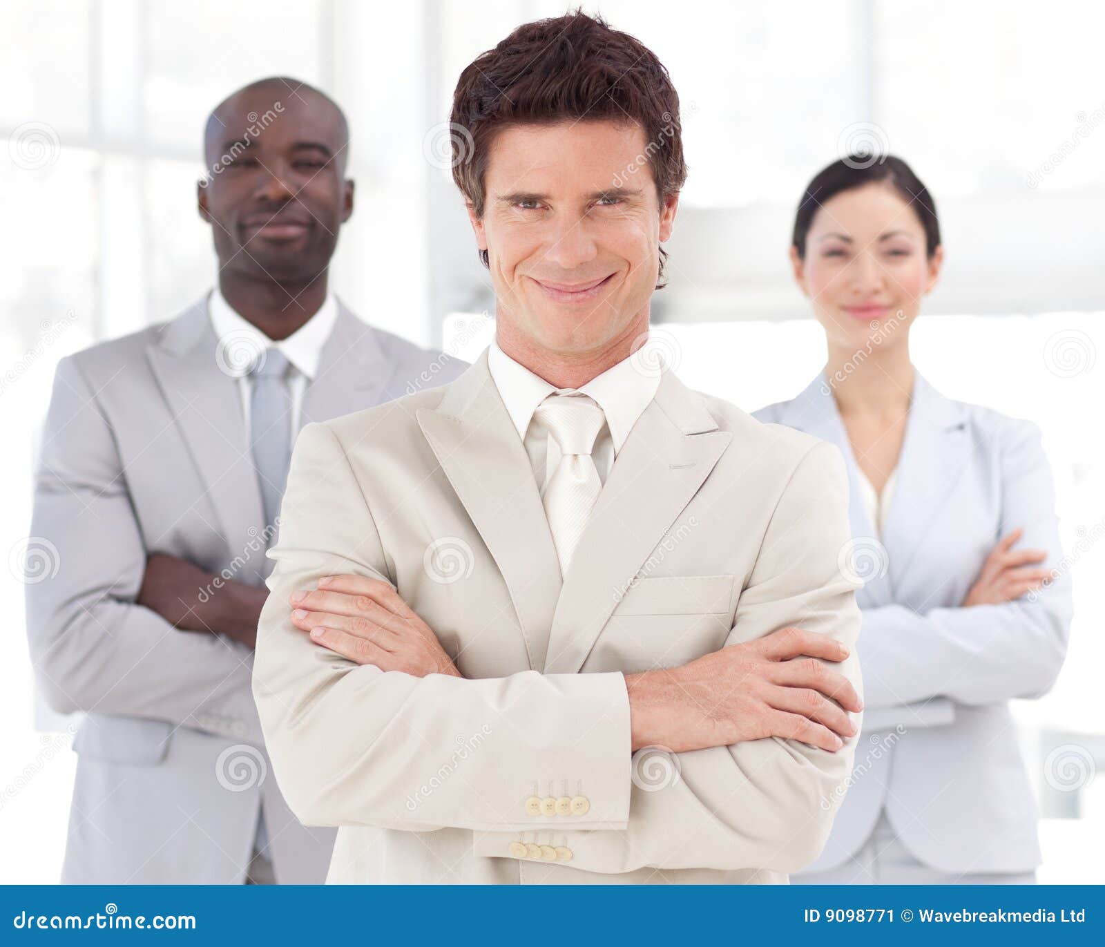 Business Man Smiling in Front of Business Team Stock Image - Image of ...