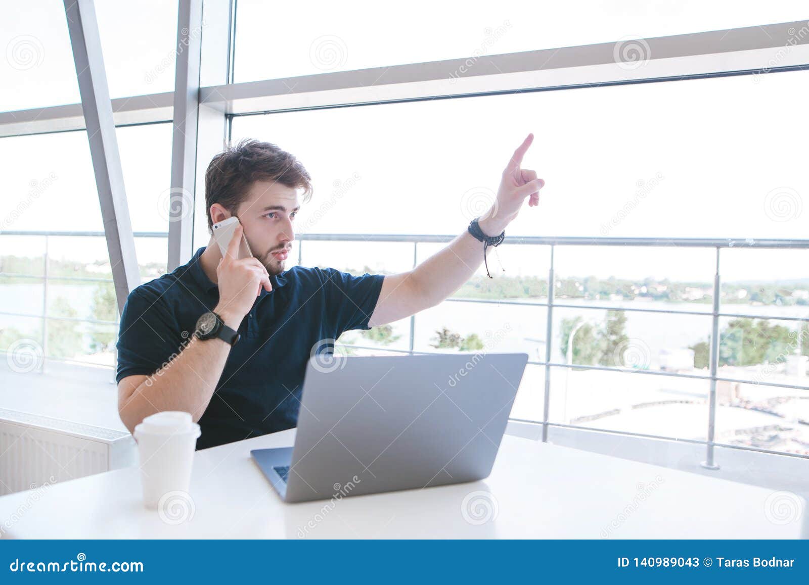 Business Man Solves Problems Over the Phone during a Break Stock Image ...