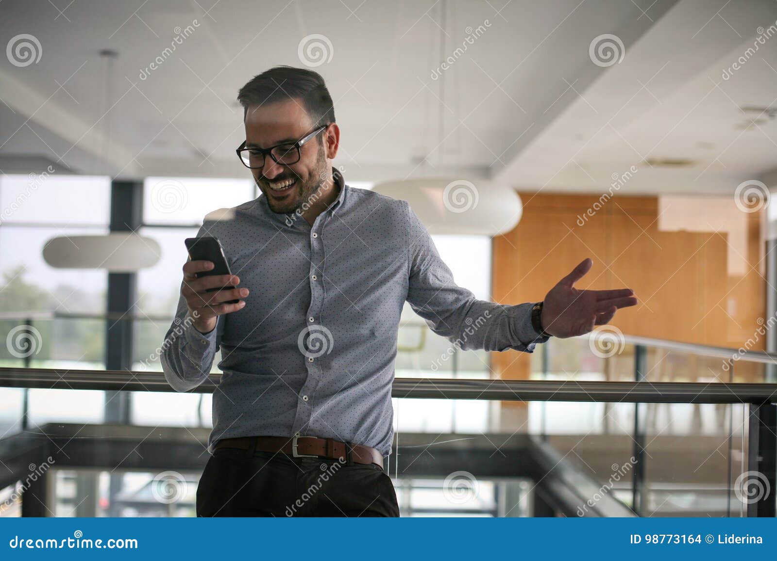 Business Man Standing in Business Building. Stock Photo - Image of ...