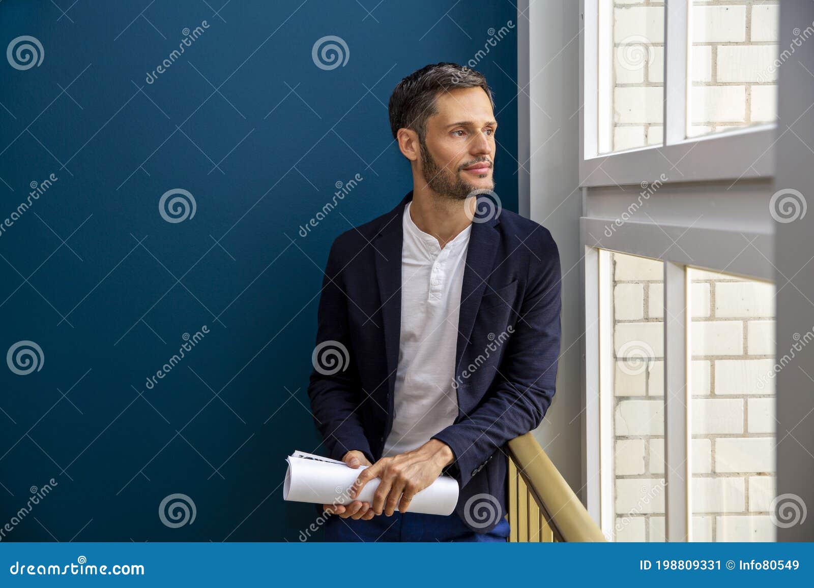 Business Man Standing Next To an Office Window Stock Image - Image of ...