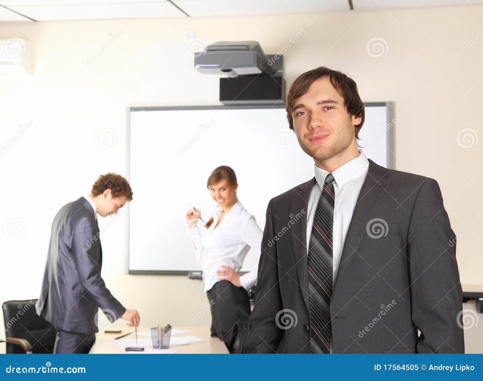 Business Man with Team Mates Discussing in the Bac Stock Image - Image ...