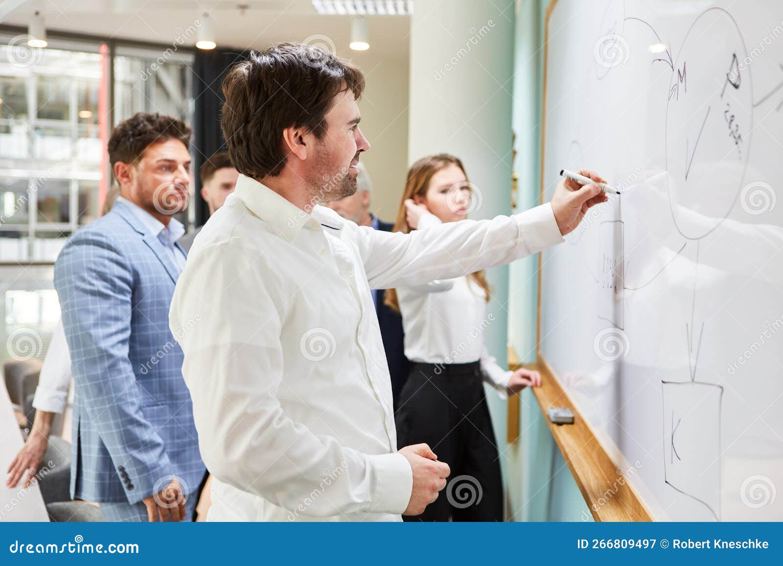 Business Man and Team at the Whiteboard in the Office Stock Image ...