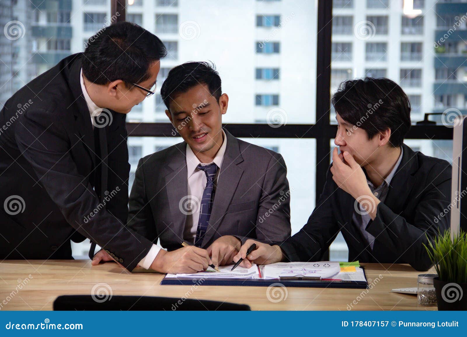Business Man Teamwork Meeting and Discuss at Desk in the Office. Stock ...