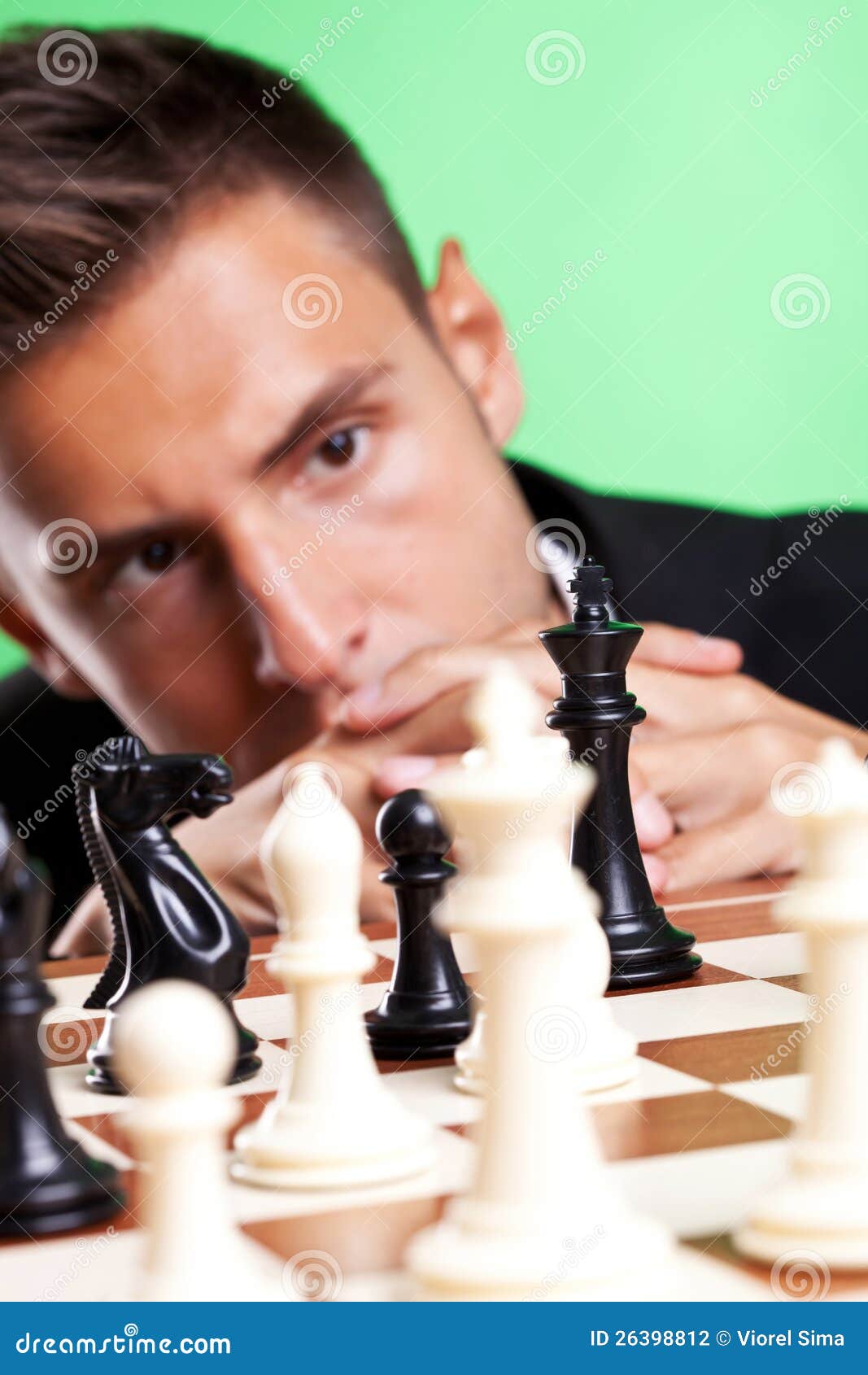 Business Man Thinking at a Chess Strategy Stock Photo - Image of green ...