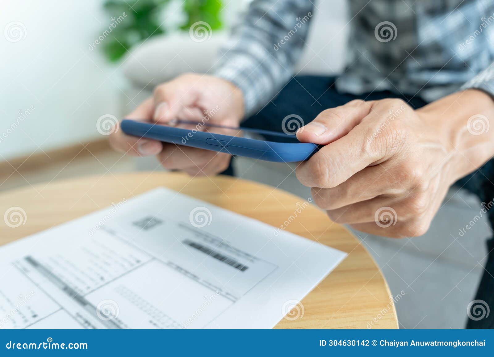 Business Man Use Phone To Scan Barcode or QR Codes To Pay Credit Card ... Business Man Use Phone To Scan Barcode or QR Codes To Pay Credit Card ...