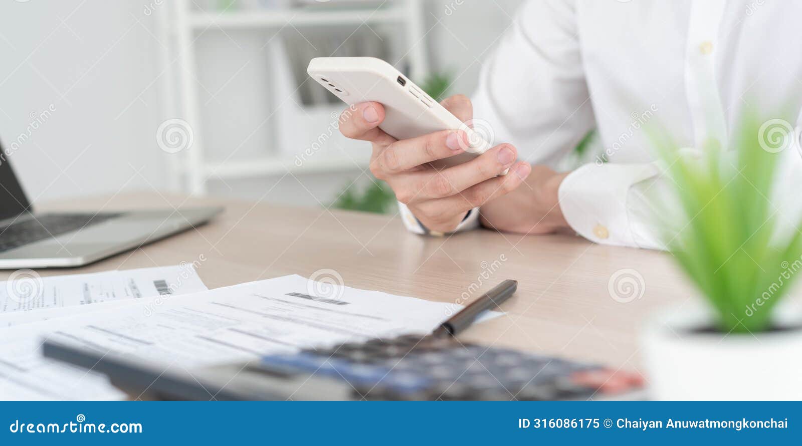 Business Man Use Phone To Scan Barcode or QR Codes To Pay Credit Card ... Business Man Use Phone To Scan Barcode or QR Codes To Pay Credit Card ...