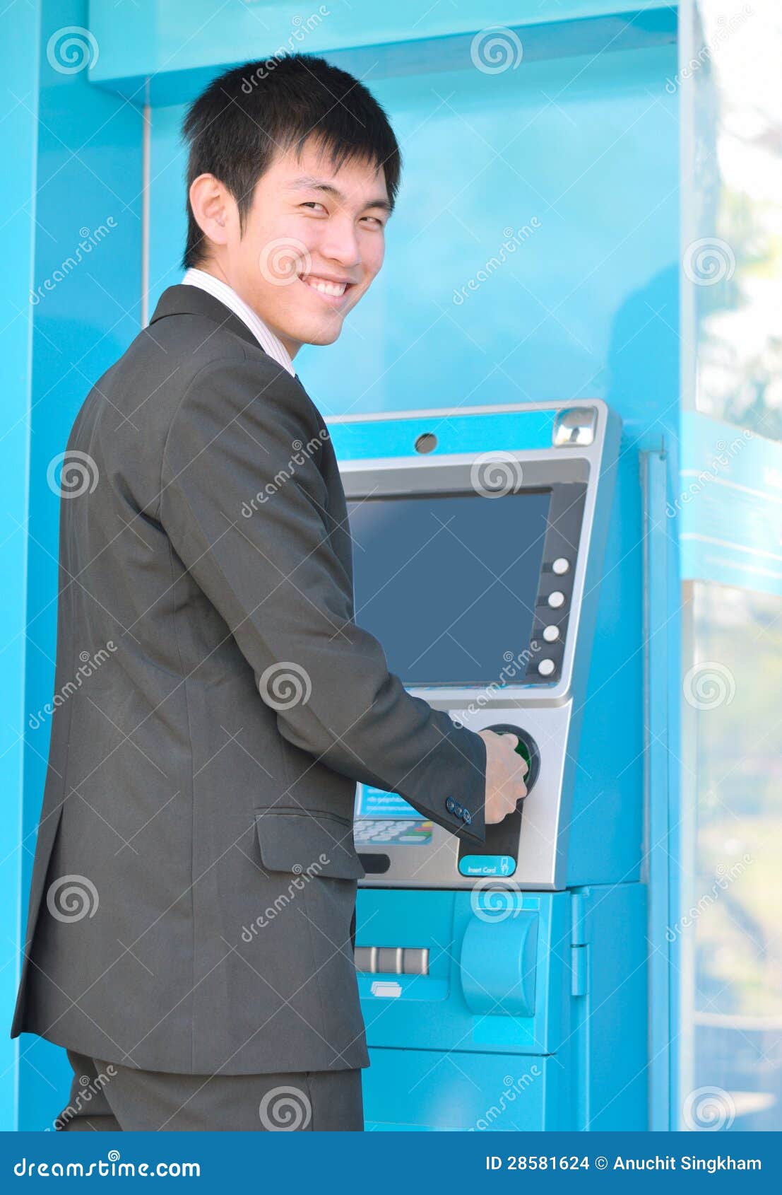 Business man using ATM stock photo. Image of bank, button - 28581624