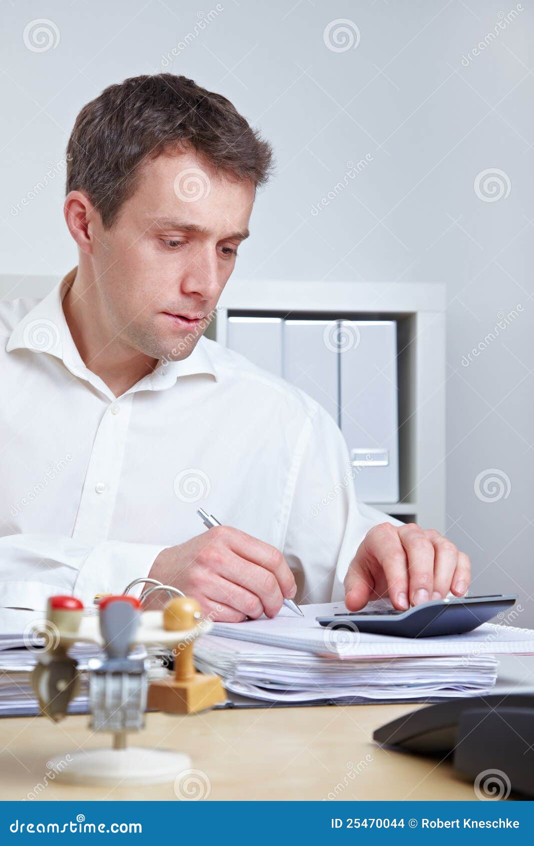 Business Man Using Calculator Stock Photo - Image of person, files ...