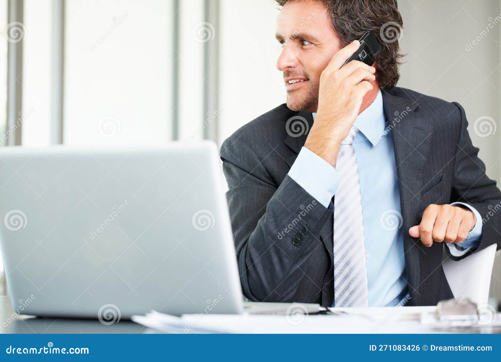 Business Man Using Cell Phone and Laptop. Smart Middle Aged Business ...