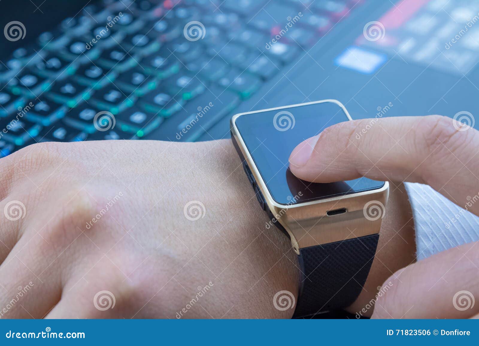 Business Man Using His Smartwatch App Near Computer Pc Keyboard on ...