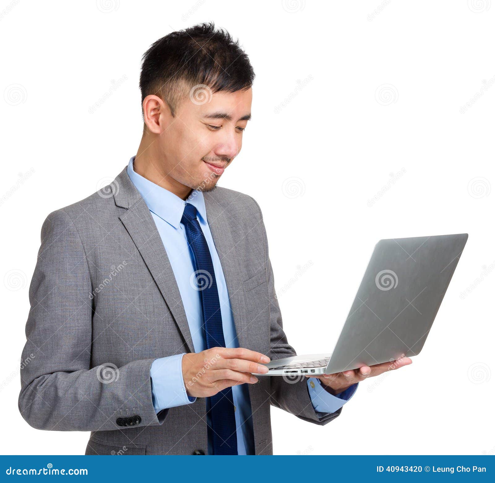 Business man using laptop stock photo. Image of media - 40943420
