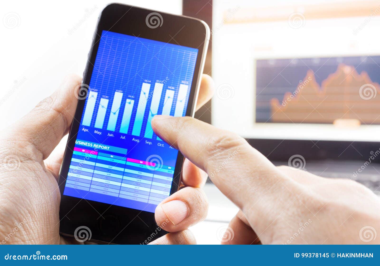 Business Man Using a Mobile Phone Device with Graph. Stock Image ...