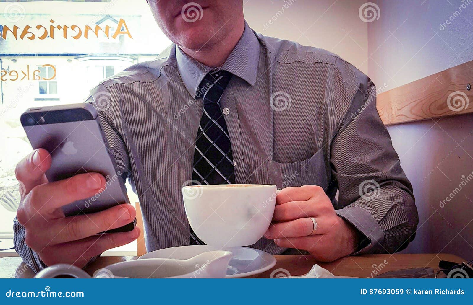 Business Man Using Smart Phone To Work through Lunch Break Editorial ...