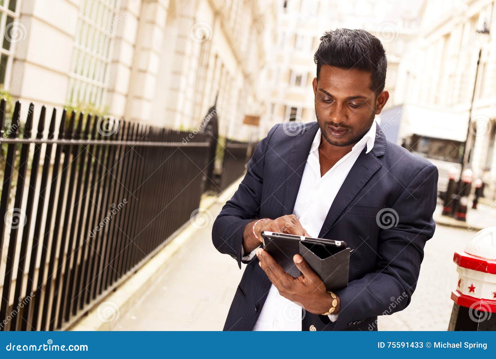 Business man using tablet stock image. Image of electronic - 75591433