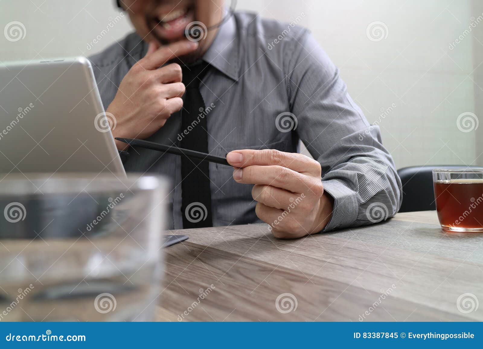 Business Man Using VOIP Headset with Digital Tablet Computer Doc Stock ...