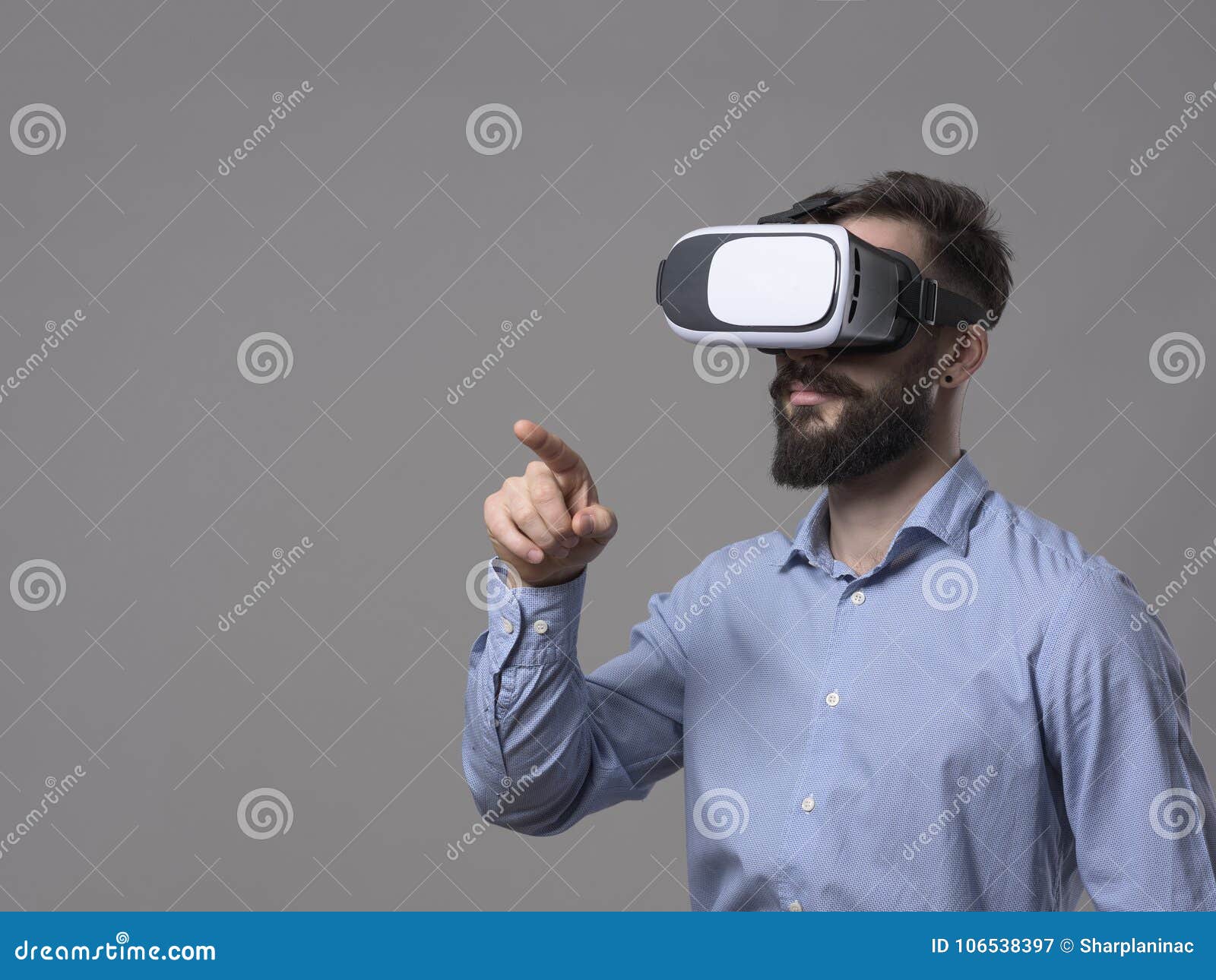 Business Man Wearing Virtual Reality Glasses Points Finger and Interact ...